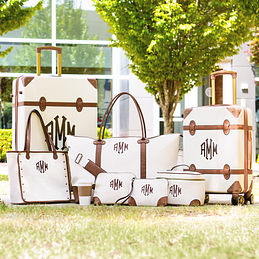 white suitcase with initials